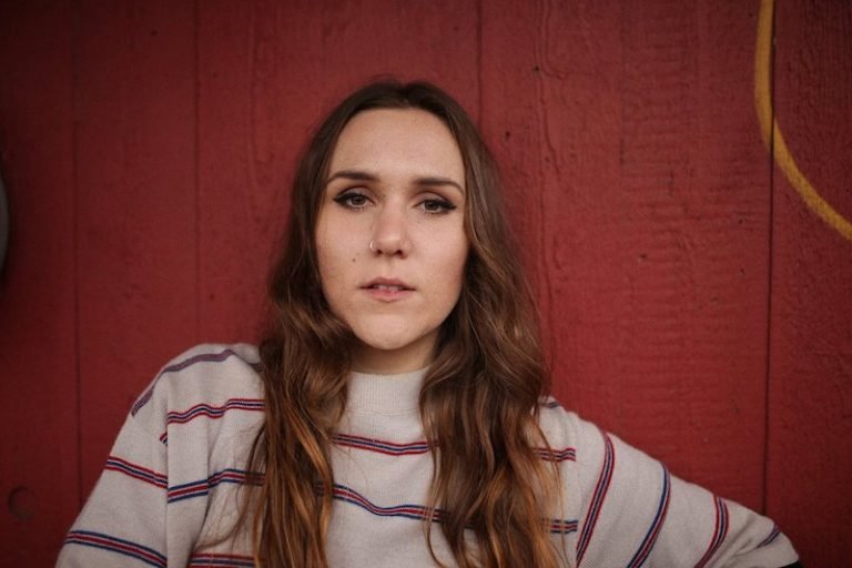 Lydia Evangeline drops an introspective pop tune titled 'Crashing Down'